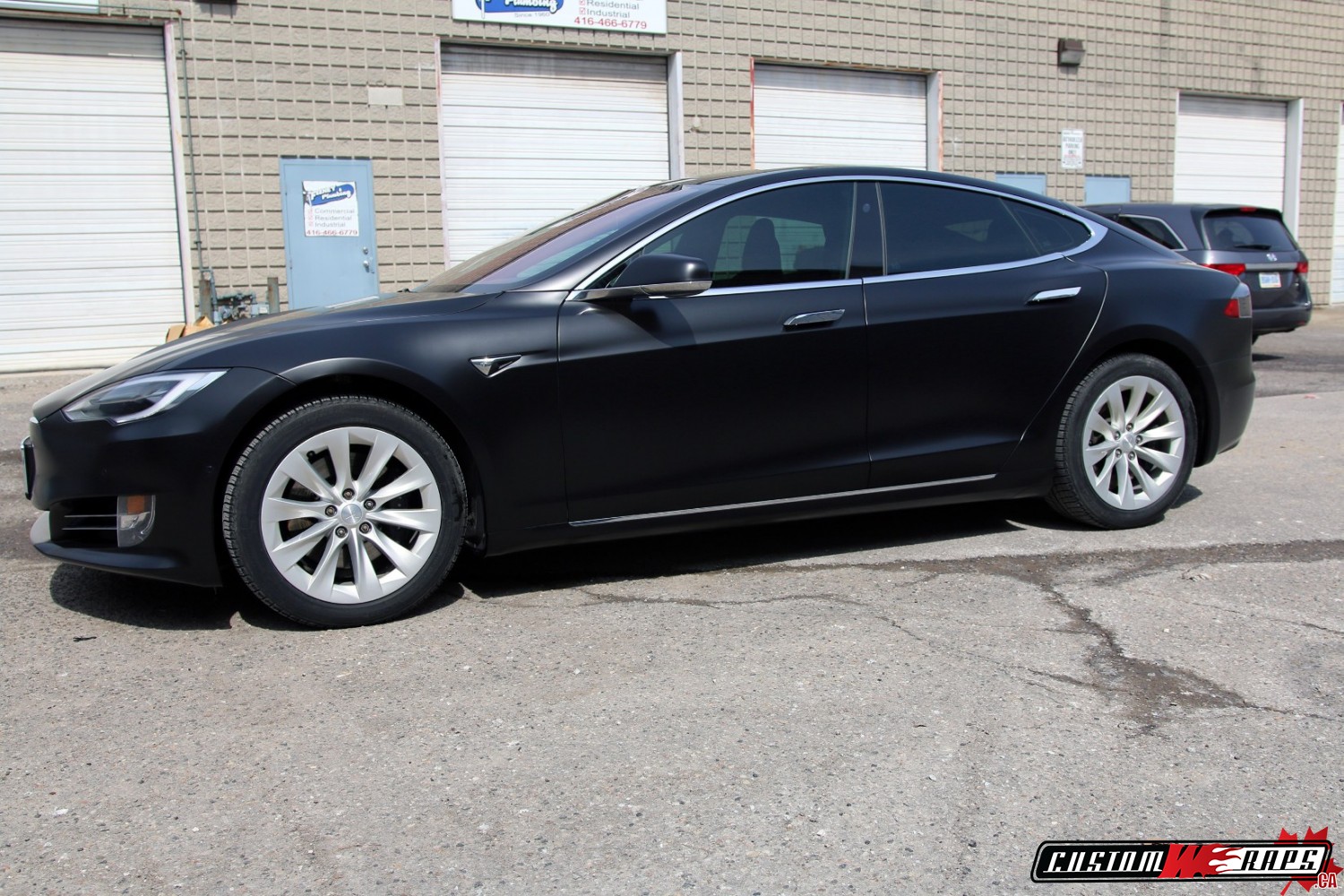 Tesla Model S Satin Black wrap - CUSTOMWRAPS.CA