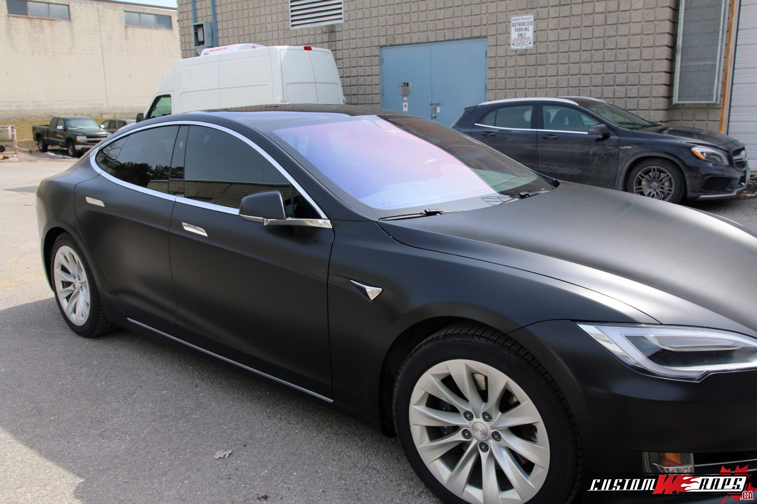 Tesla Model S Satin Black wrap - CUSTOMWRAPS.CA