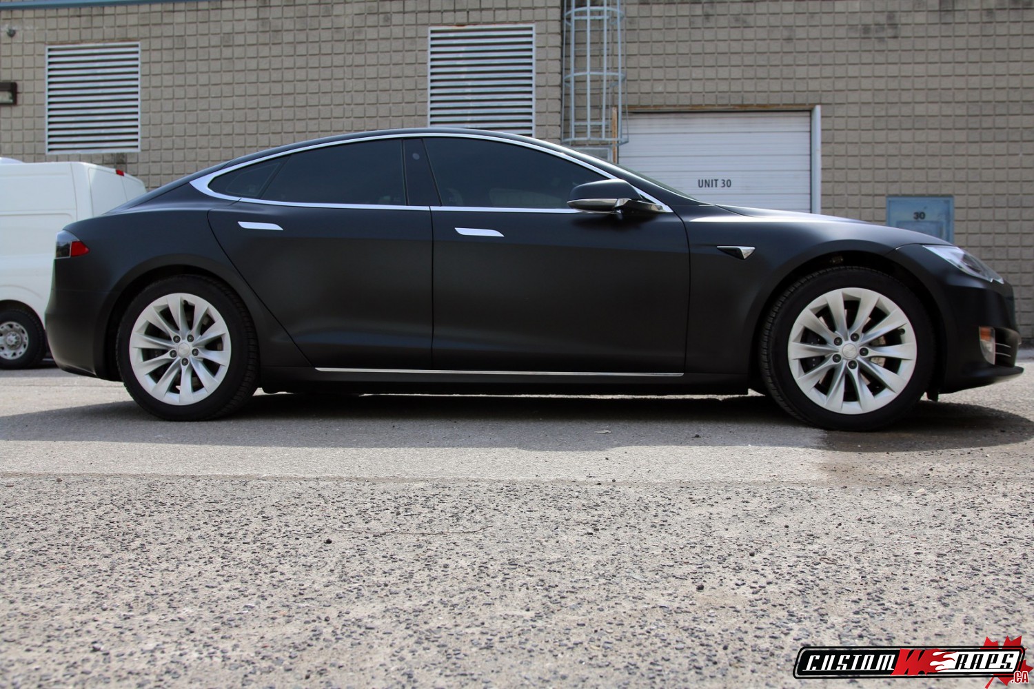 Tesla Model S Satin Black wrap - CUSTOMWRAPS.CA
