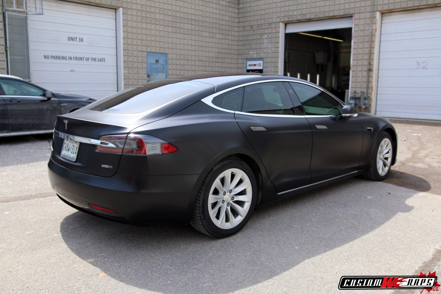 Tesla Model S Satin Black wrap - CUSTOMWRAPS.CA