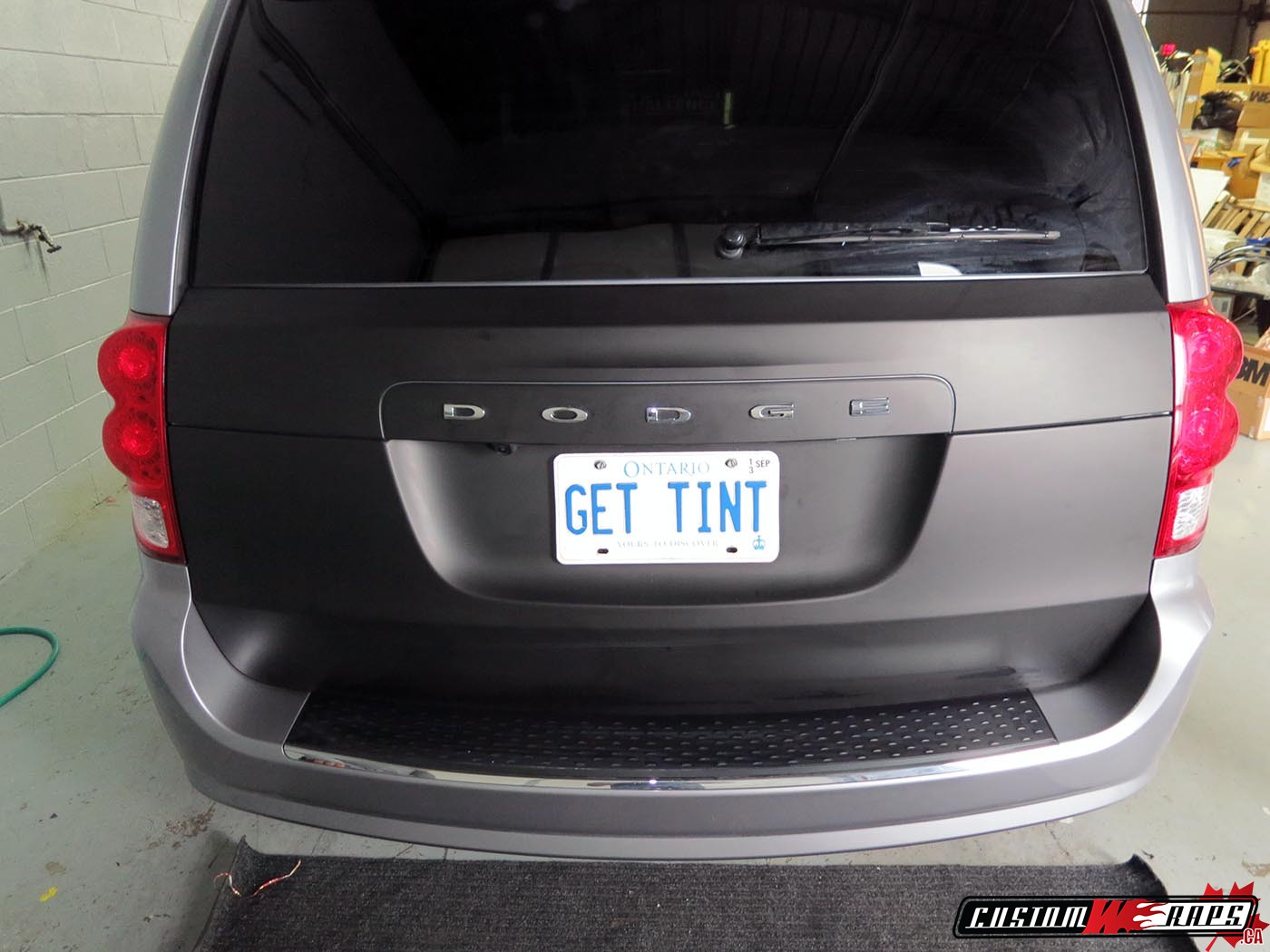 Dodge Caravan Matte Black partial wrap - CUSTOMWRAPS.CA